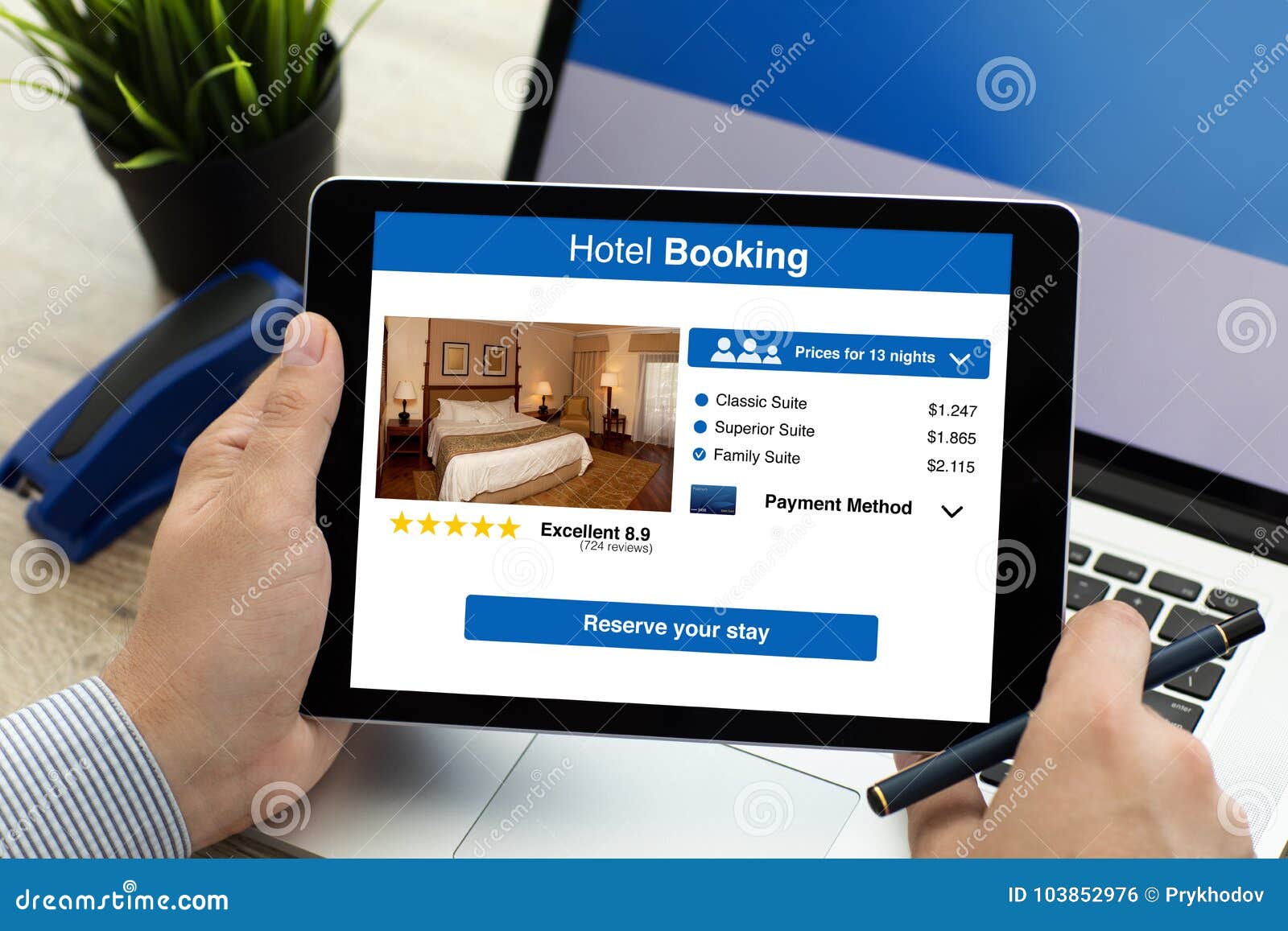 Man Holding Tablet with App Hotel Booking on Screen Stock Photo - Image ...