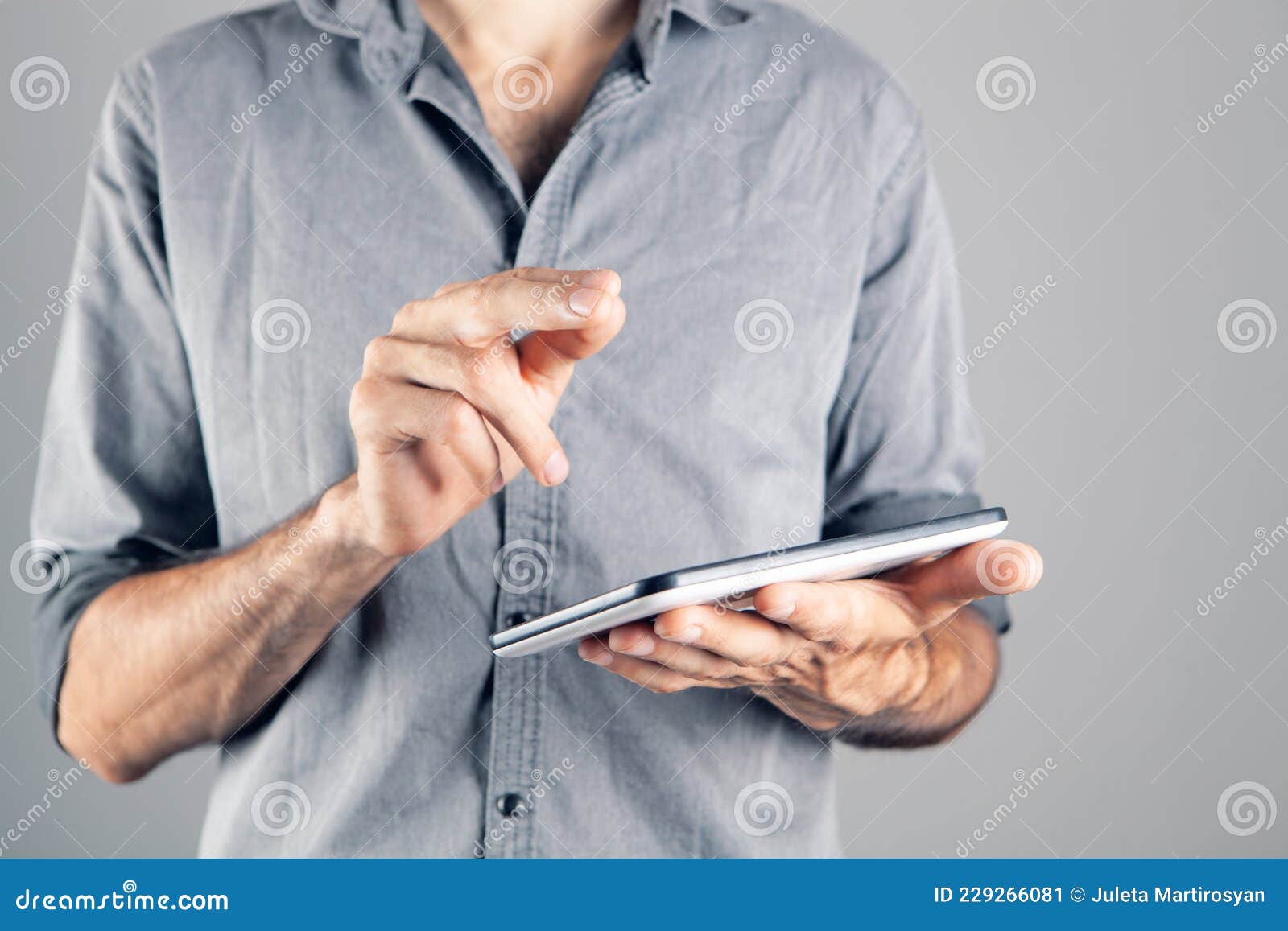 A Man Holding a Tablet in His Hand Stock Image - Image of tablet ...