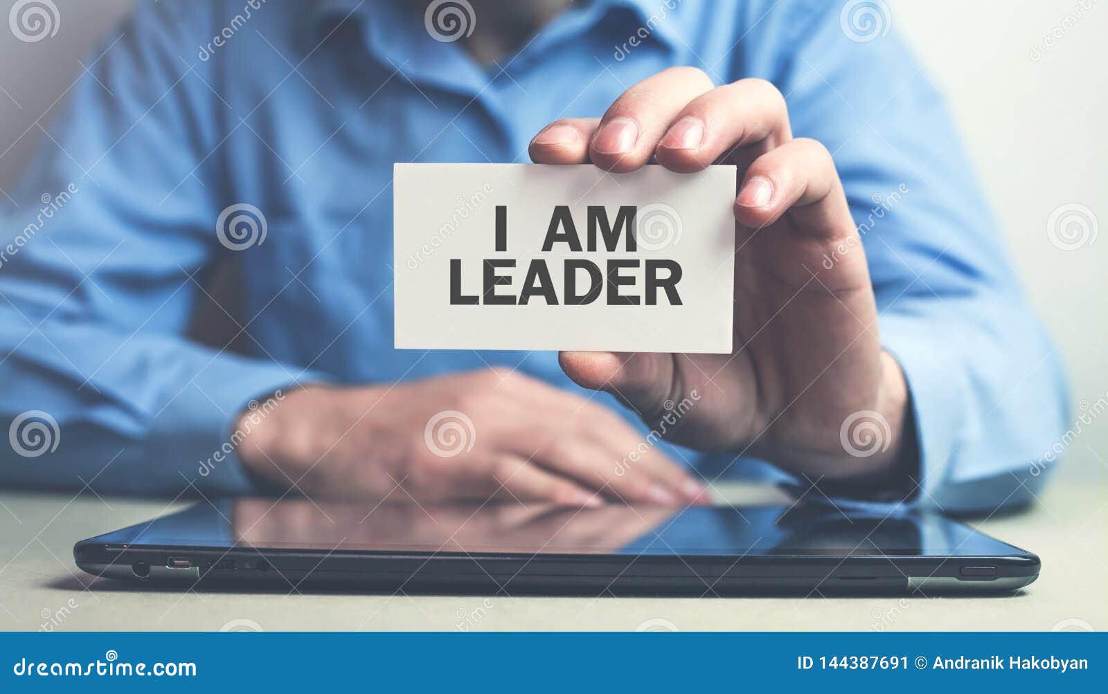 Man Holding Text I am Leader on Business Card Stock Image - Image of ...