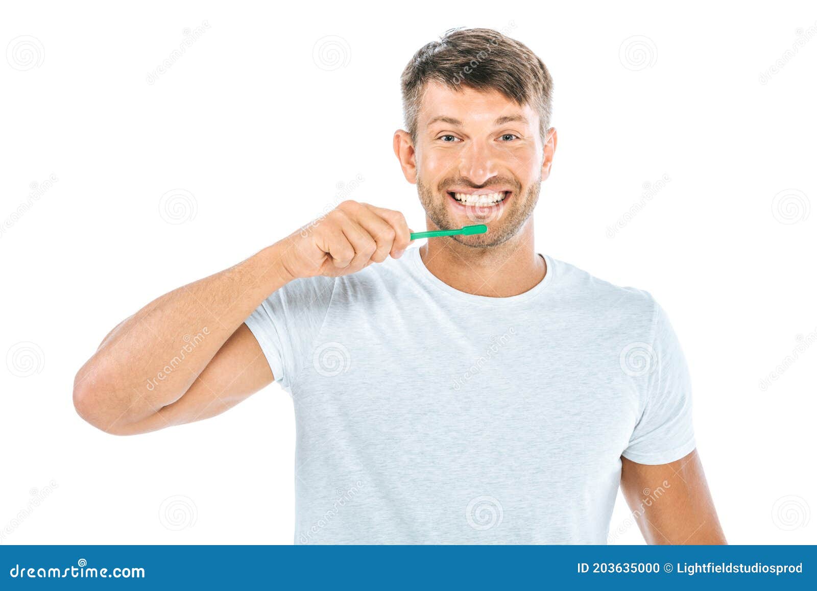 Man Holding Toothbrush while Smiling Isolated Stock Photo - Image of ...