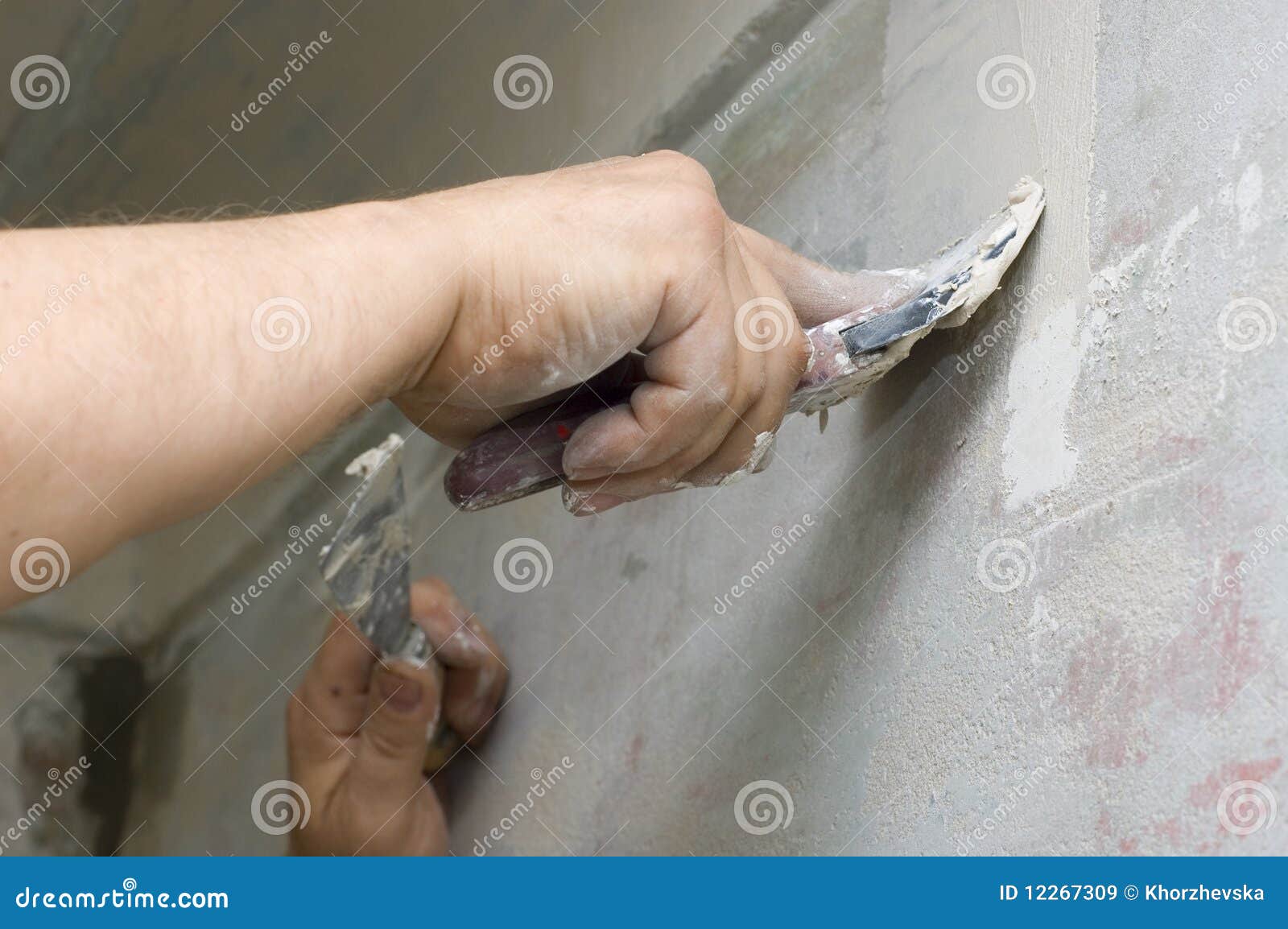 Man holding a trowel stock image. Image of plastering - 12267309