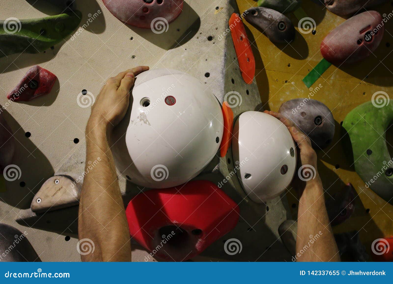 A Man Holding Two Very Difficult Grips that are Smooth during a ...