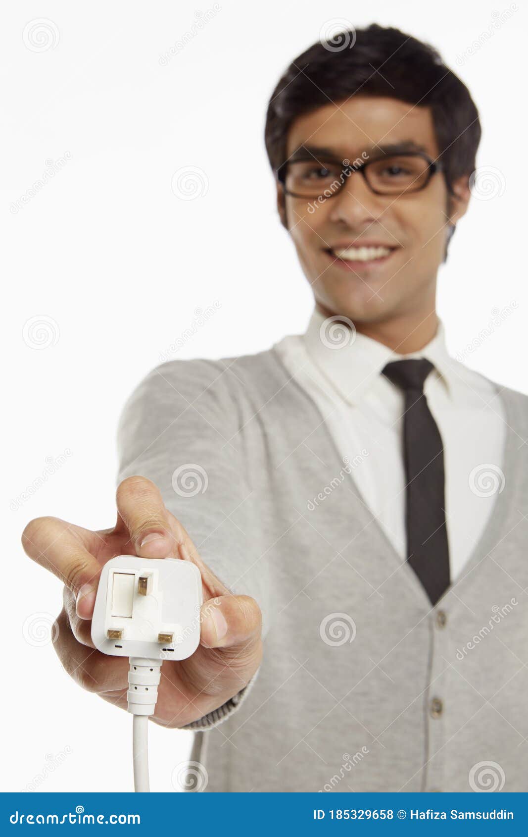 Man Holding Up an Electrical Plug Stock Photo - Image of electrical ...
