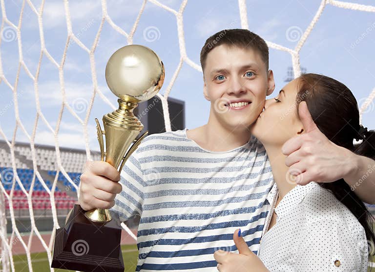 Man Holding Up A Gold Trophy Cup As A Winner Stock Image Image Of