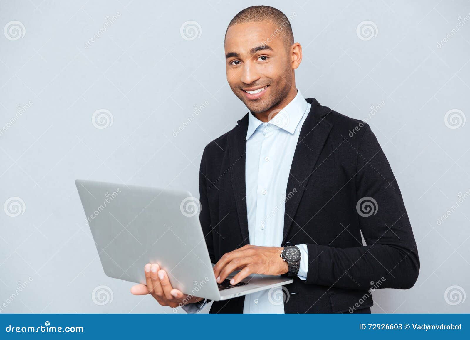 Man Holding and Using Laptop Stock Image - Image of mixed, copy: 72926603