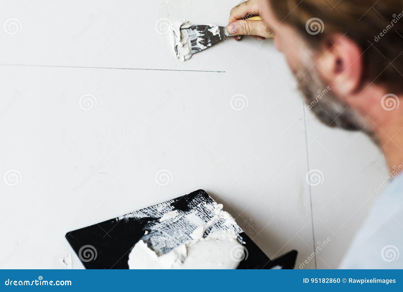 Man Holding Using Trowel Working on the Wall Stock Photo - Image of ...