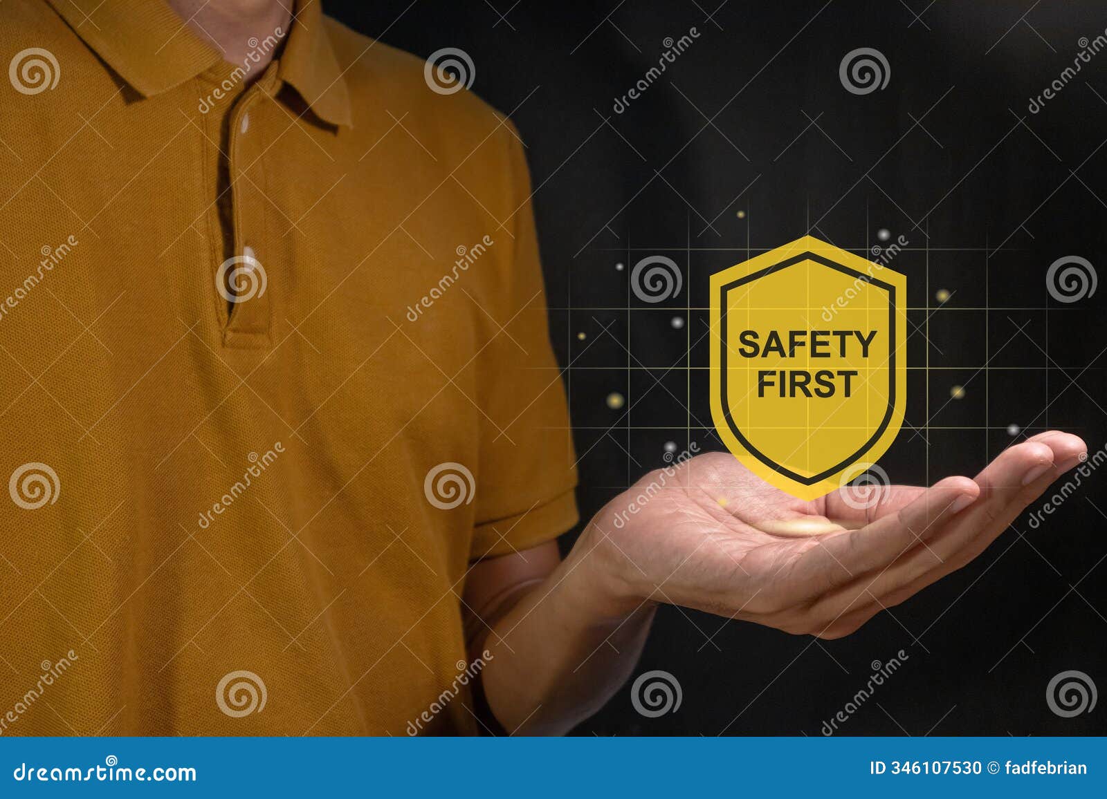 Man Holding a Virtual Safety First Symbol. Safety First Concept Stock ...