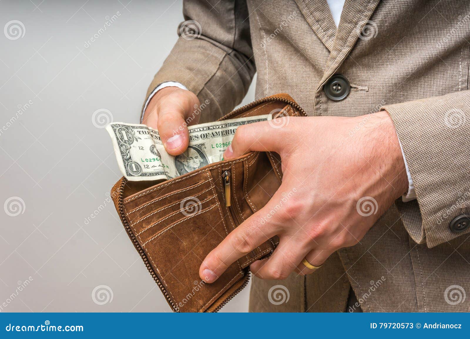 Man Holding Wallet with only One Dollar Inside Stock Image - Image of ...