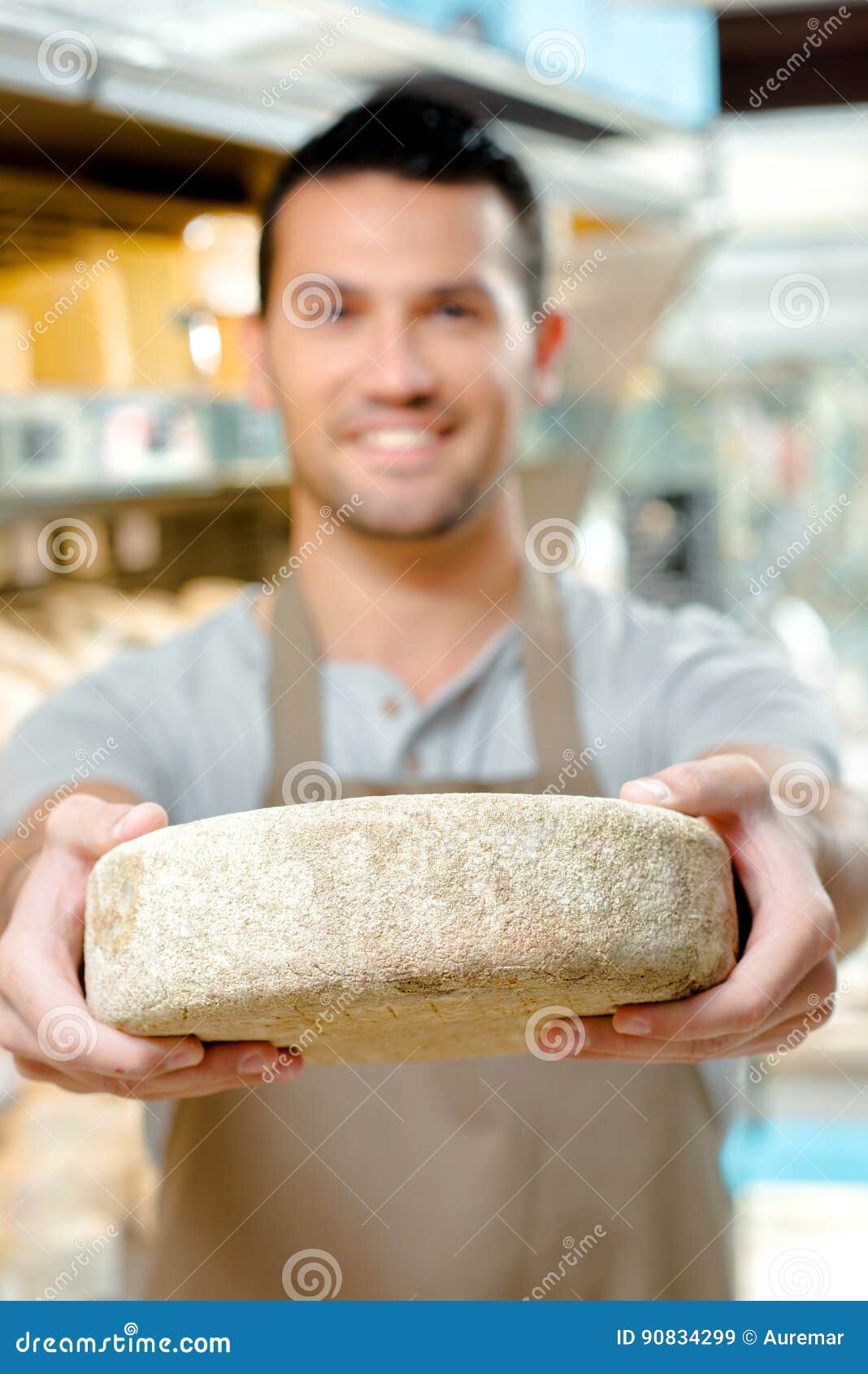 Man holding wheel cheese stock image. Image of creamery - 90834299