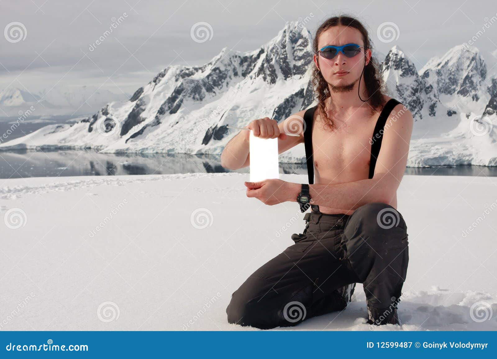 Man holding a white form stock image. Image of front - 12599487