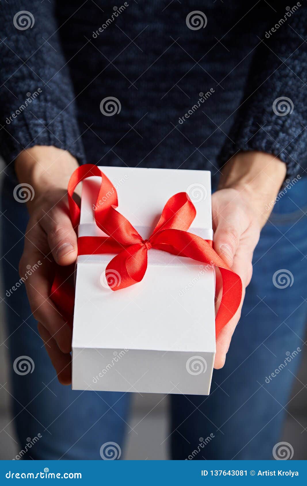 A Man Holding White Gift Box with Red Ribbon in His Hands Stock Image ... A Man Holding White Gift Box with Red Ribbon in His Hands Stock Image ...