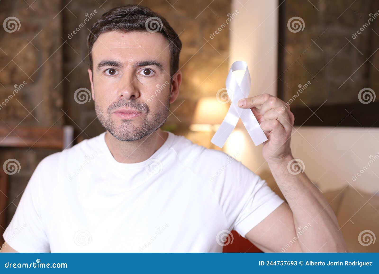 Man holding a white ribbon stock image. Image of medical - 244757693