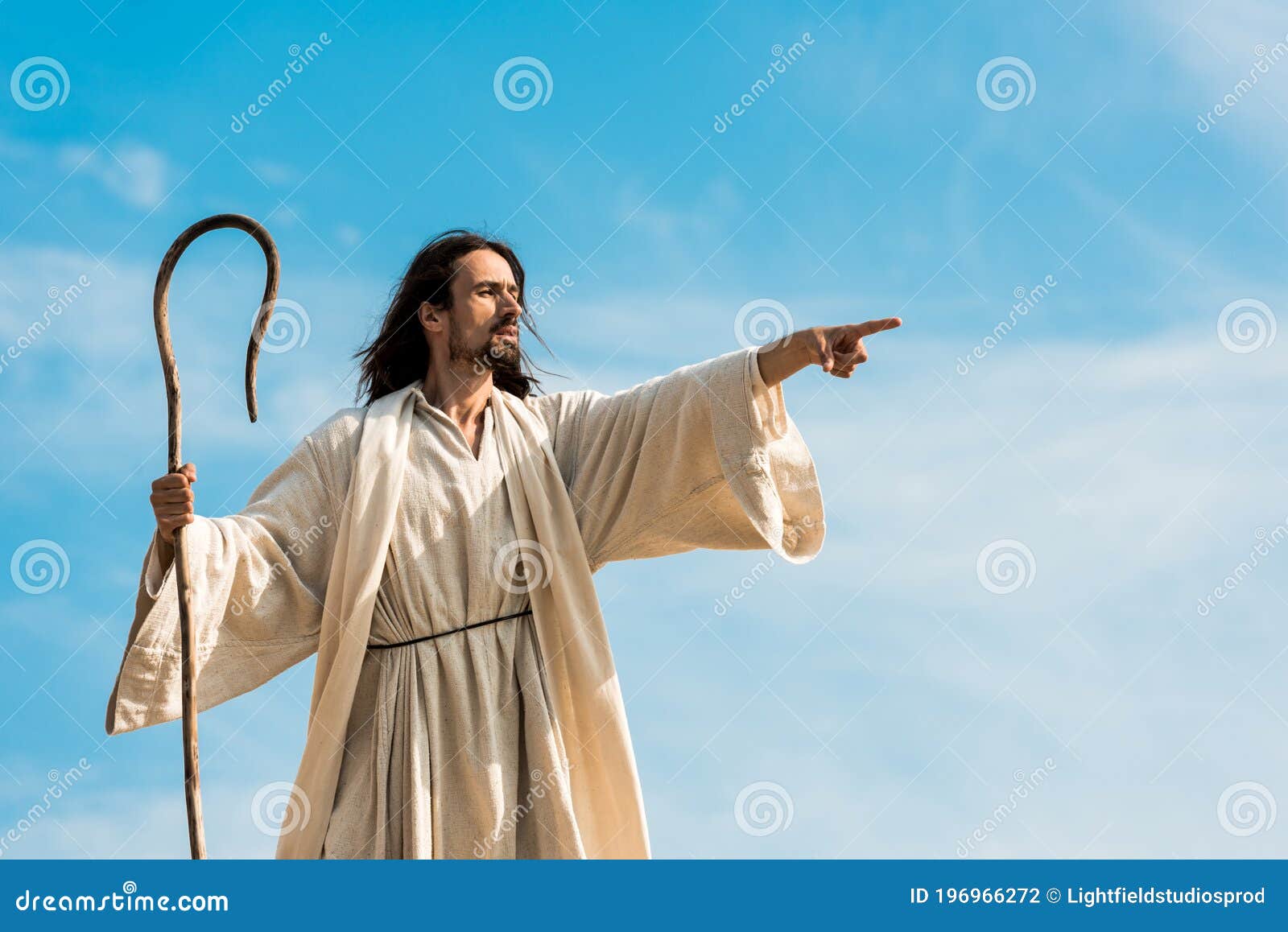 Man Holding Wooden Cane and Pointing with Finger Stock Photo - Image of ...