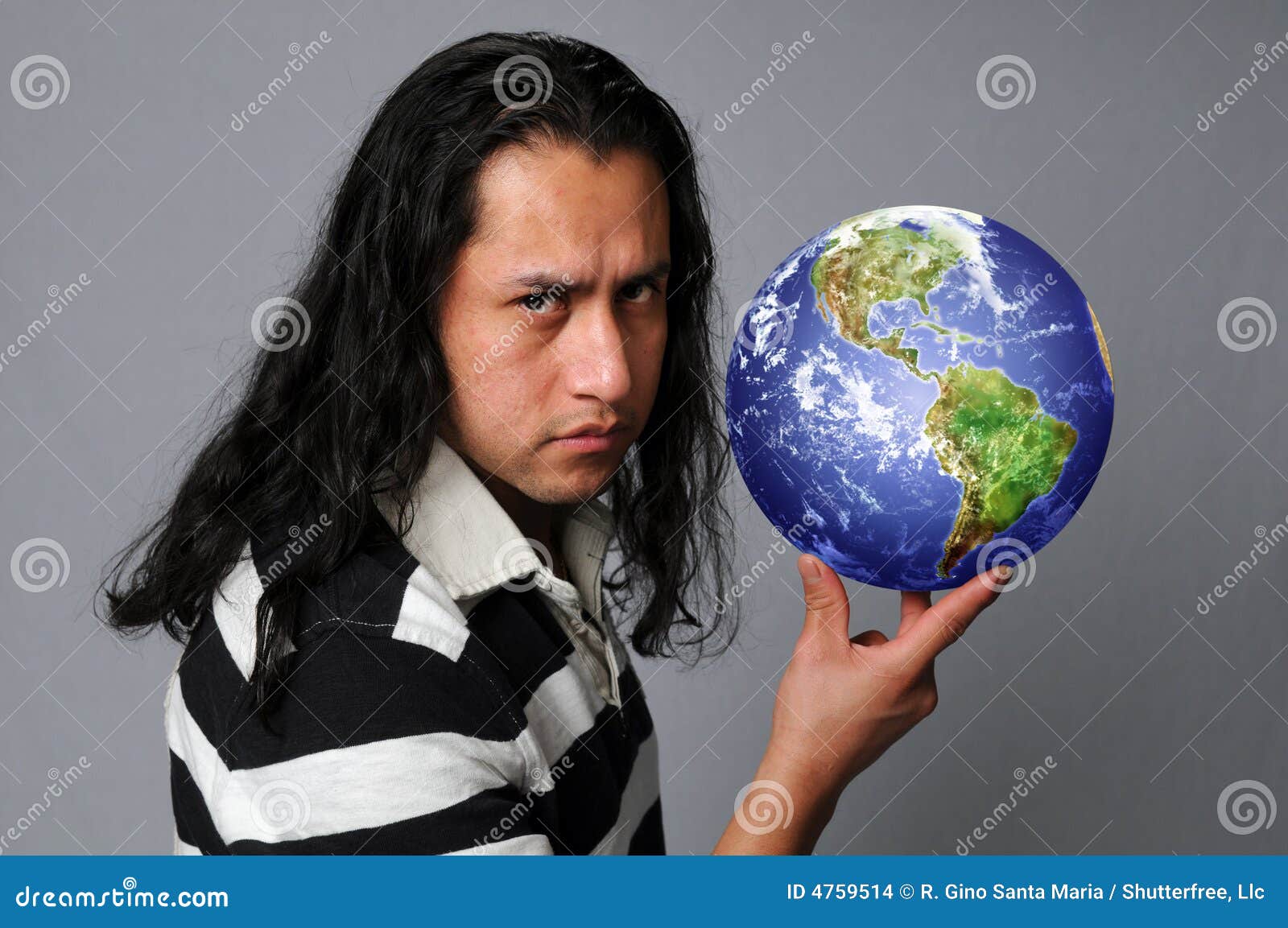 Man holding world in hand stock photo. Image of hispanic - 4759514