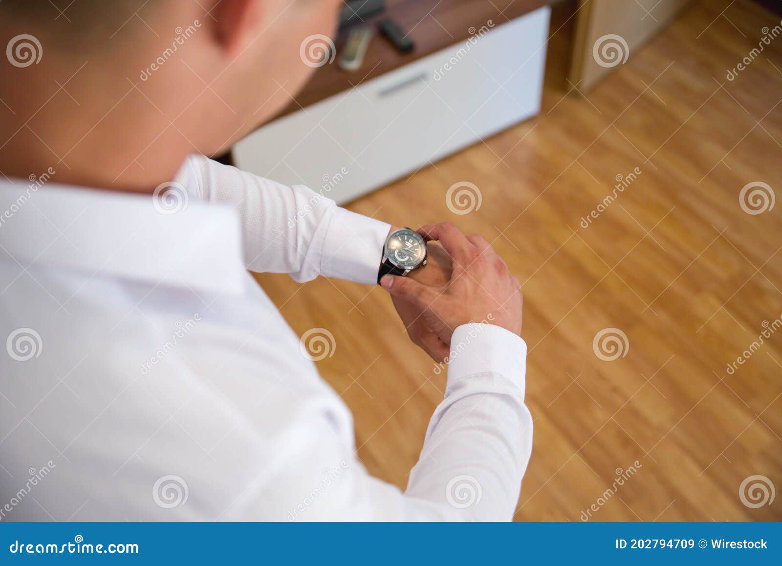 Man Holding a Wristwatch on His Arm Stock Image - Image of male, time ...