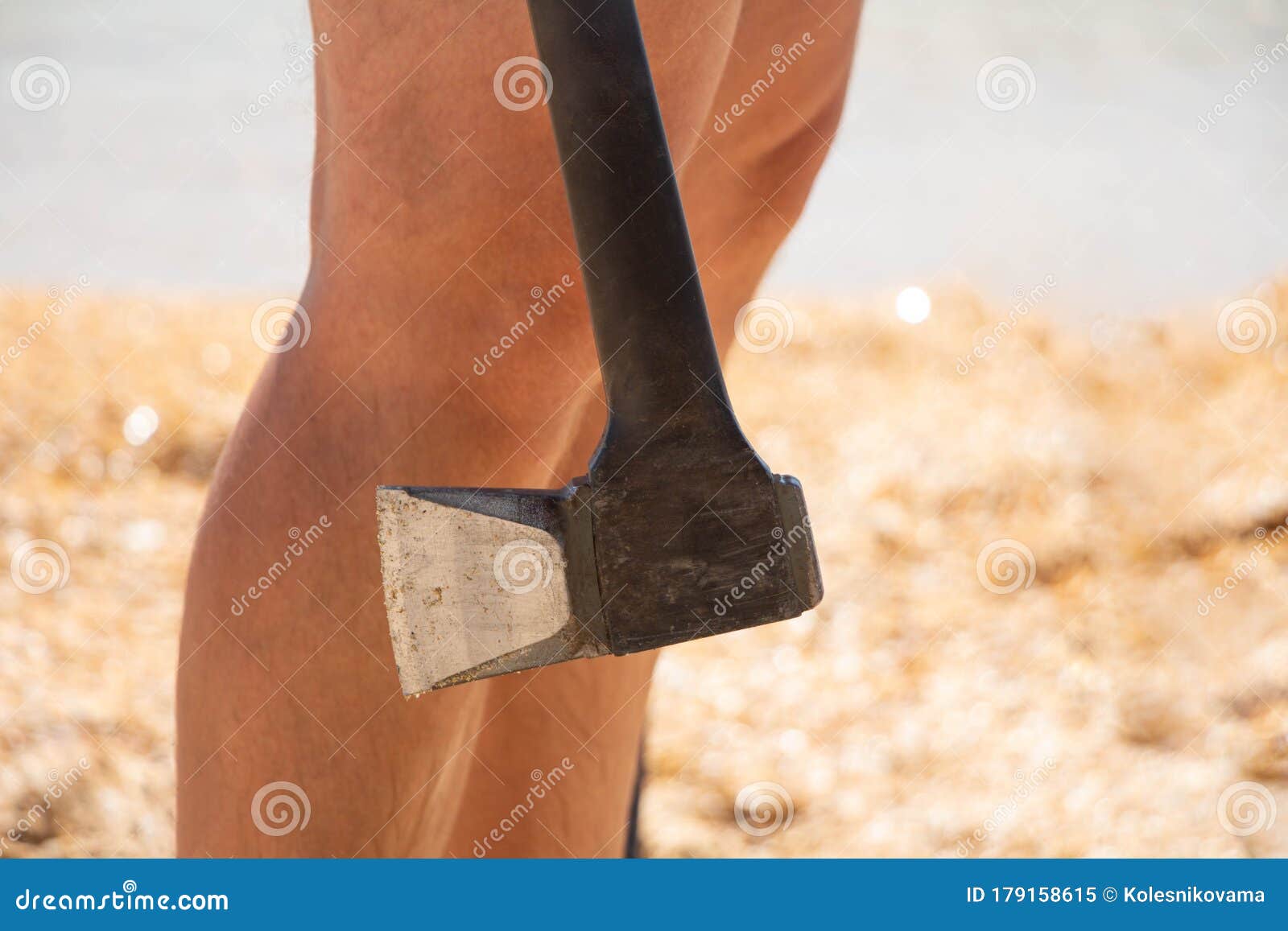 A Man Holds an Ax in His Hand. Stock Image - Image of holding ...