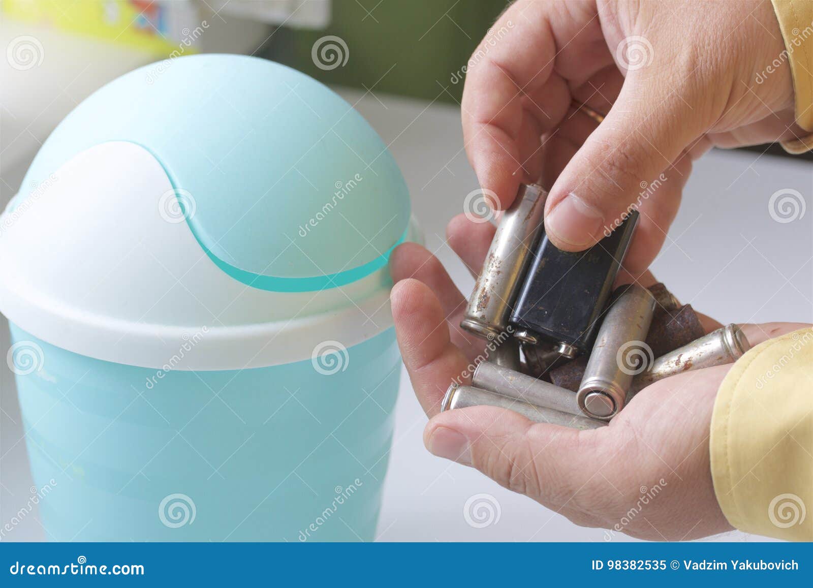 The Man Holds the Batteries in His Hand. Stock Image - Image of battery ...