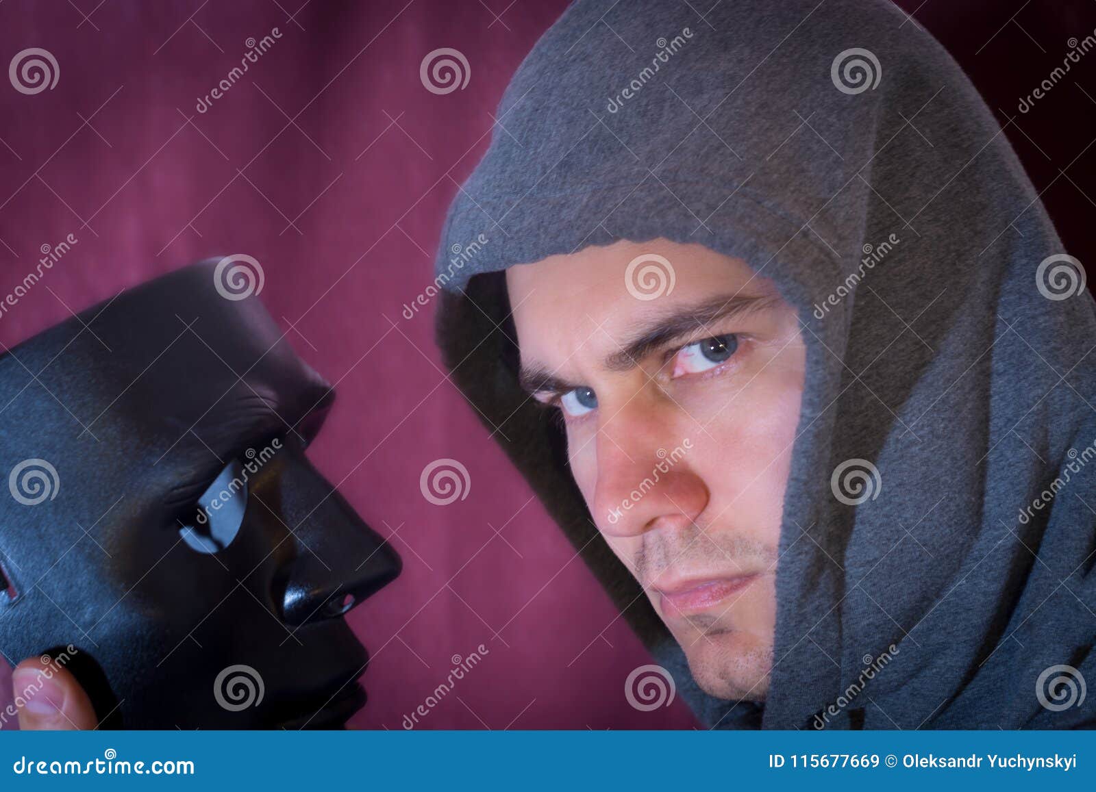 Man with a Mask in His Hand Stock Image - Image of recollection, crime ...