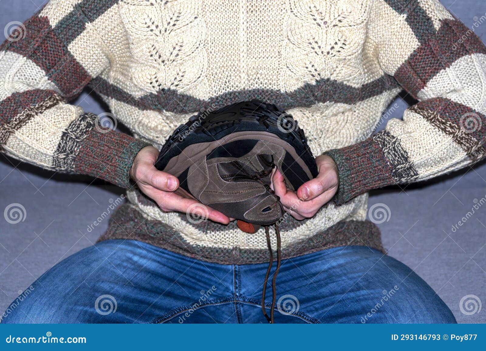 The Man Holds Shoes in Hands. Stock Image - Image of close, hand: 293146793