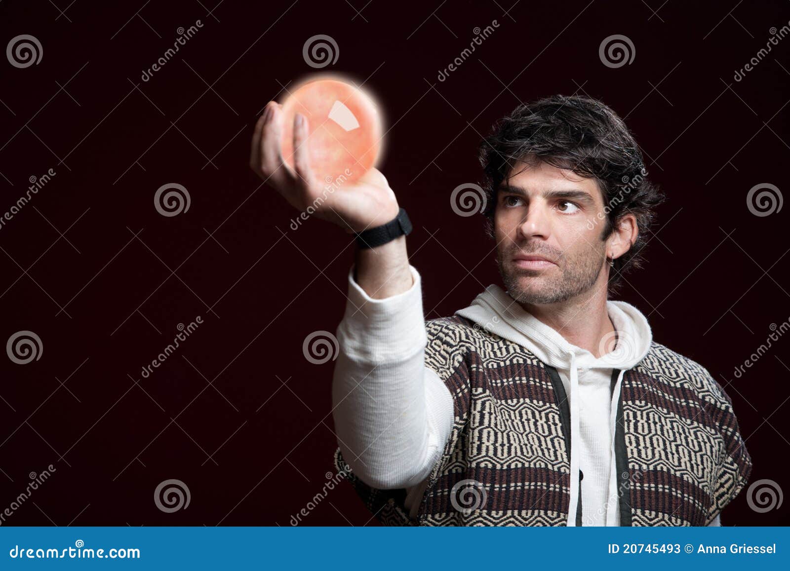 Man Holds a Crystal Ball stock image. Image of glow, look - 20745493