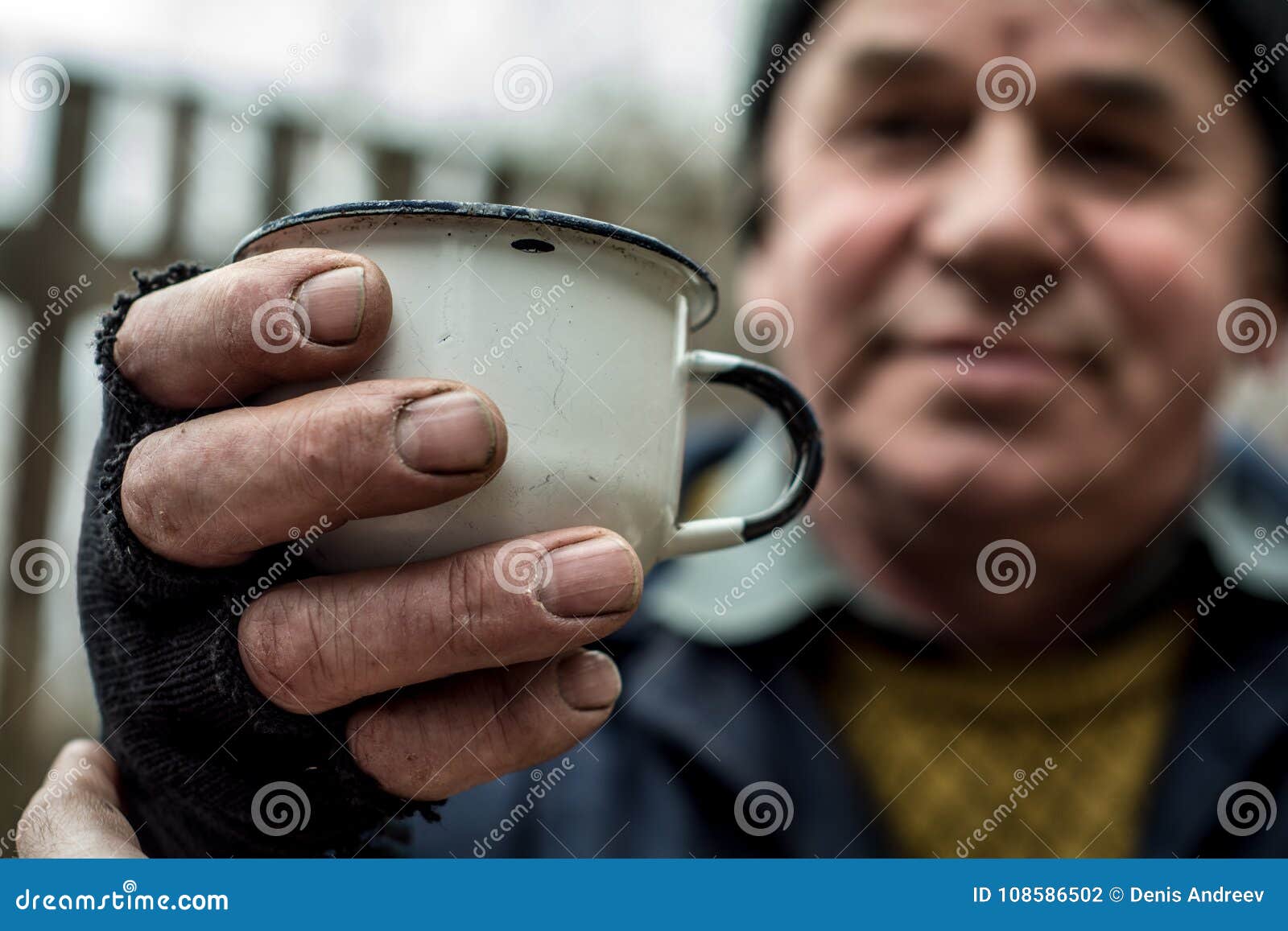 A Man Holds a Cup in an Outstretched Hand. Stock Photo - Image of holds ...