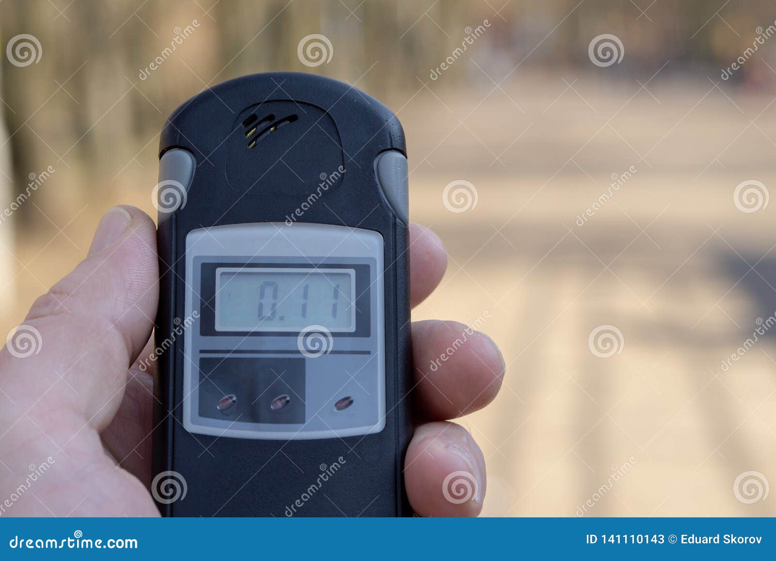 A Man Holds a Device To Measure the Level of Radiation Stock Image ...
