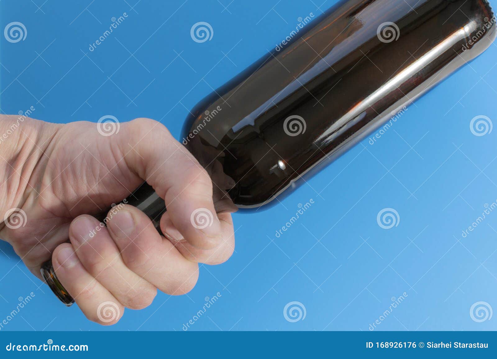 The Man Holds an Empty Bottle in His Hand Stock Photo - Image of ...