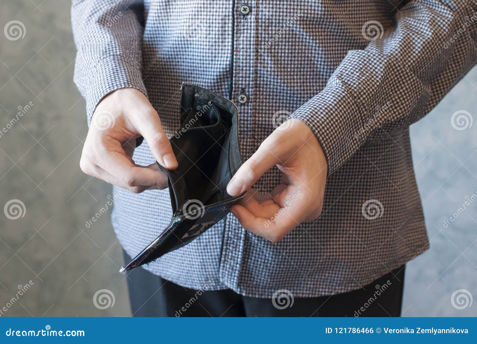 The Man Holds an Empty Purse in Hand. Stock Photo - Image of business ...