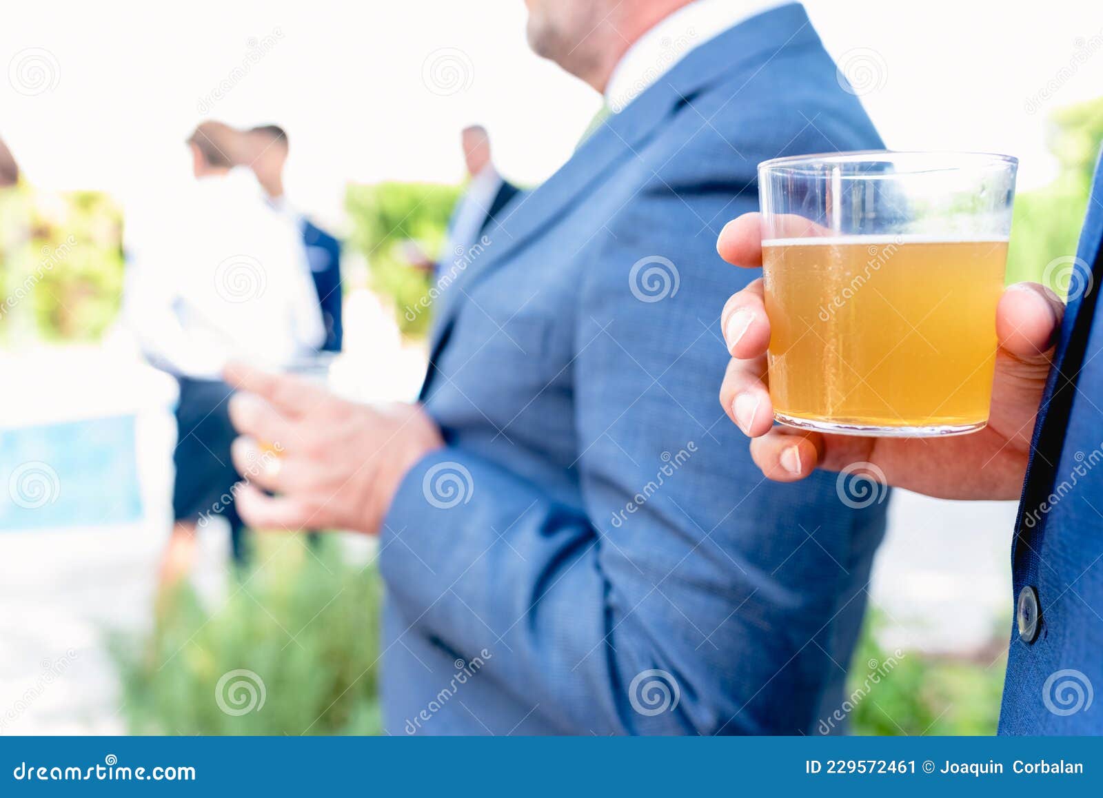 A Man Holds a Glass with Cider during a Party Stock Image - Image of ...