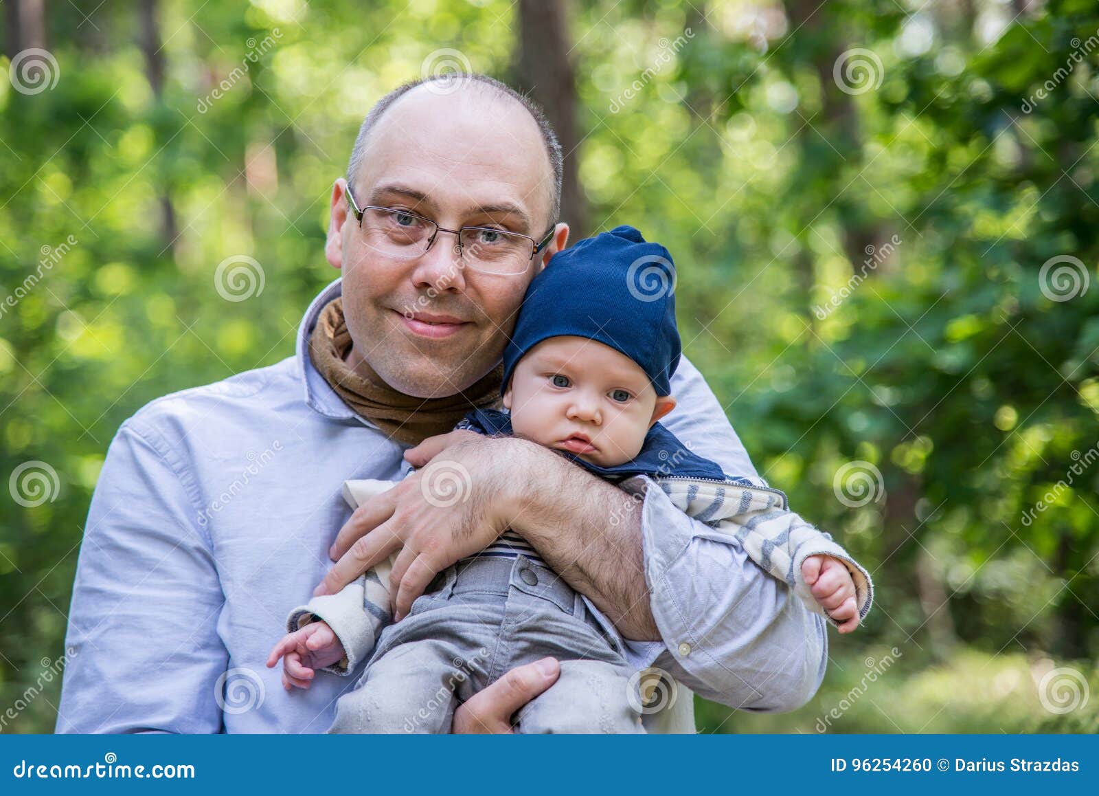 Man Holds His Baby Male Son Stock Photo - Image of adorable, parent ...