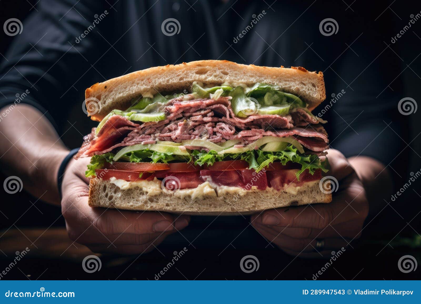 A Man Holds a Huge Sandwich in His Hands Stock Image - Image of ...