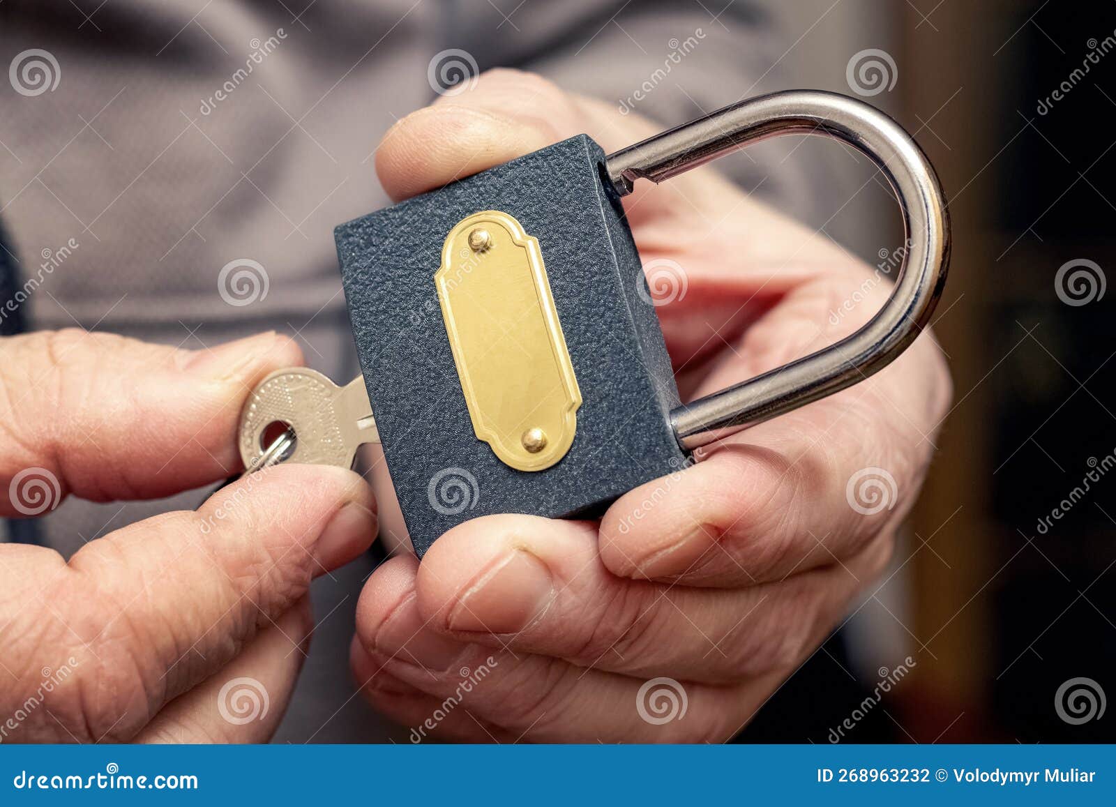 A Man Holds a Padlock with Keys in His Hand Stock Photo - Image of iron ...