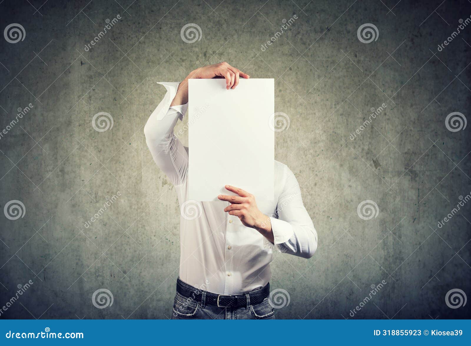 Man Holds a Sheet of White Paper in Front of His Face, Hiding His ...