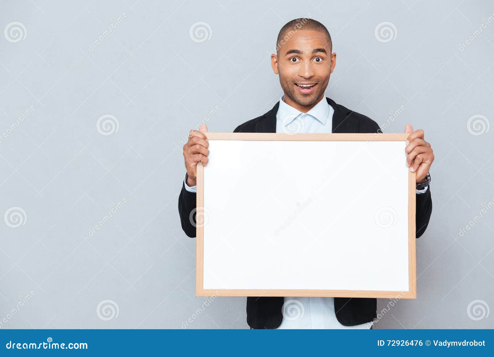 Man holsing whiteboard stock photo. Image of confidence - 72926476
