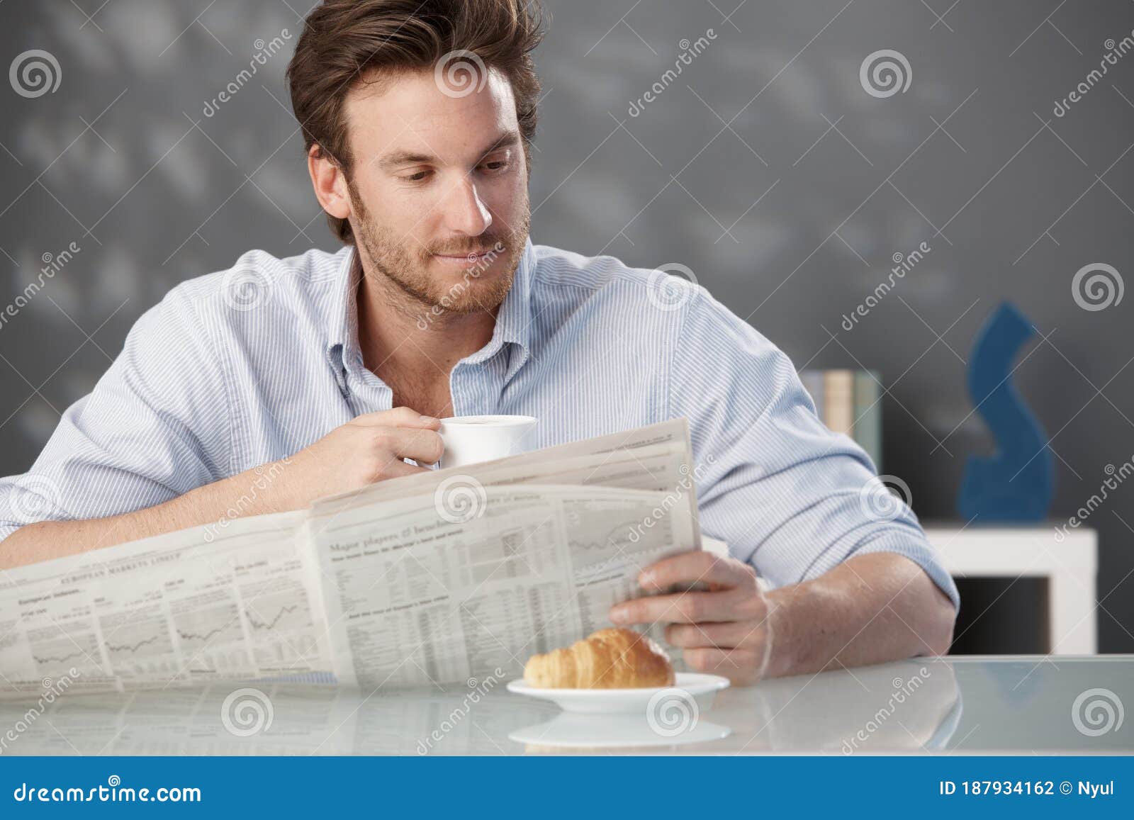 Man at Home Having Breakfast Reading Newspaper at Morning Stock Photo ...