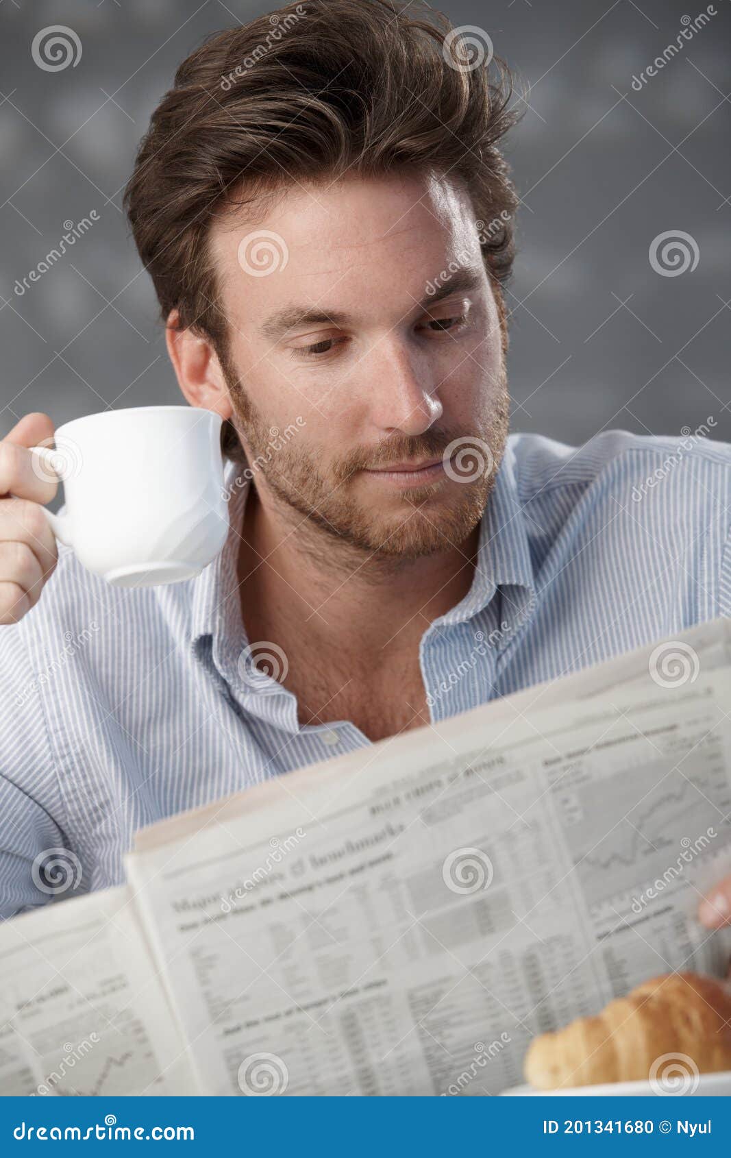 Man at Home Having Breakfast Reading Newspaper at Morning Stock Photo ...