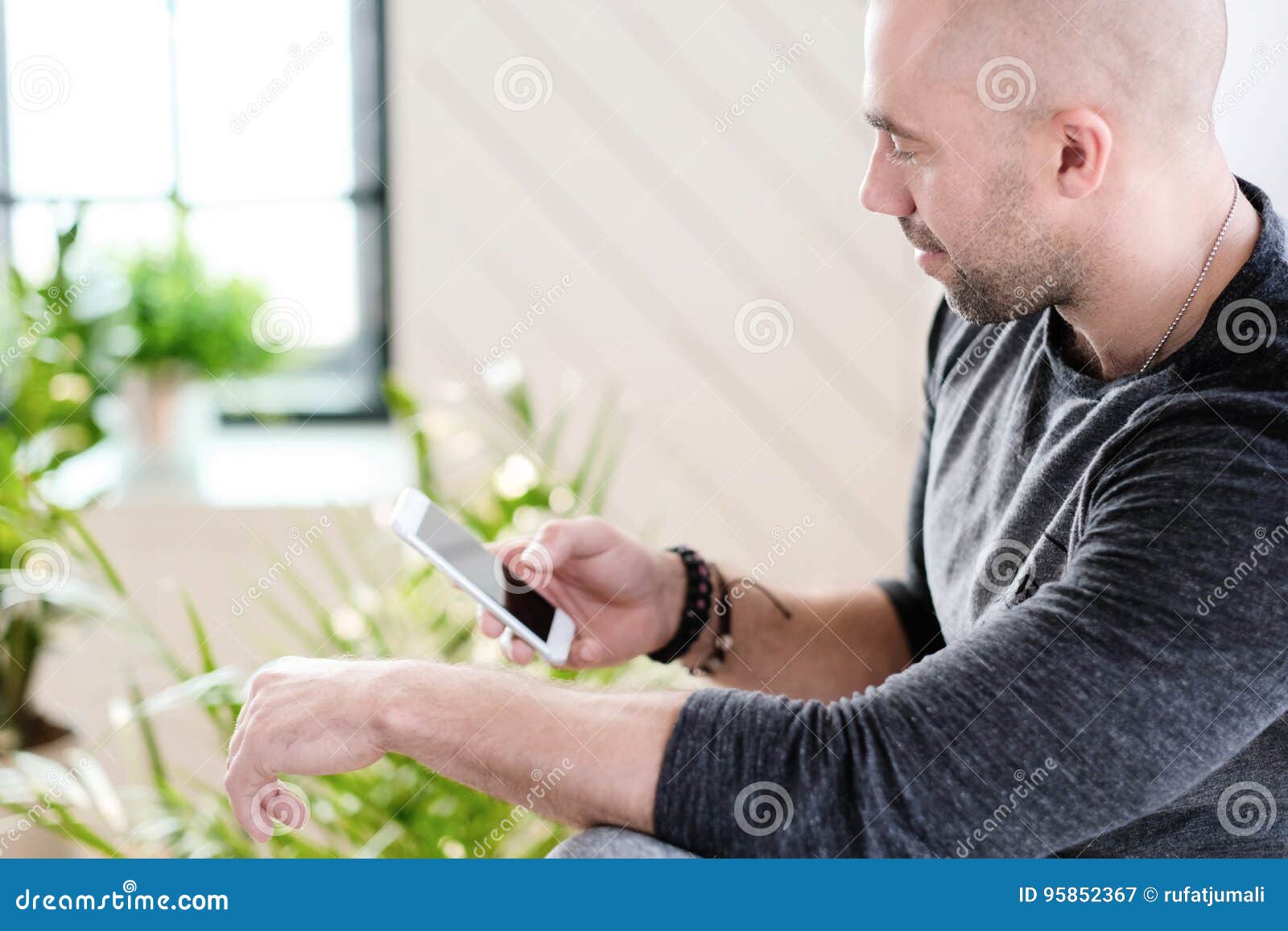 Man at home stock image. Image of happy, phone, natural - 95852367