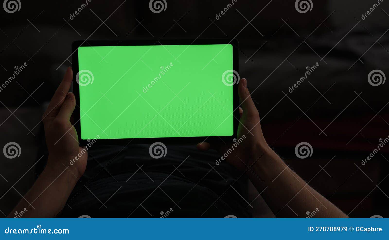 Man at Home Lying on a Couch with Tablet Pc with Green Screen Stock ...