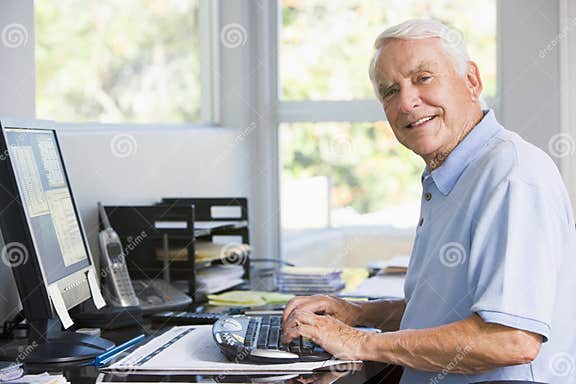 Man in Home Office Using Computer Smiling Stock Photo - Image of ...