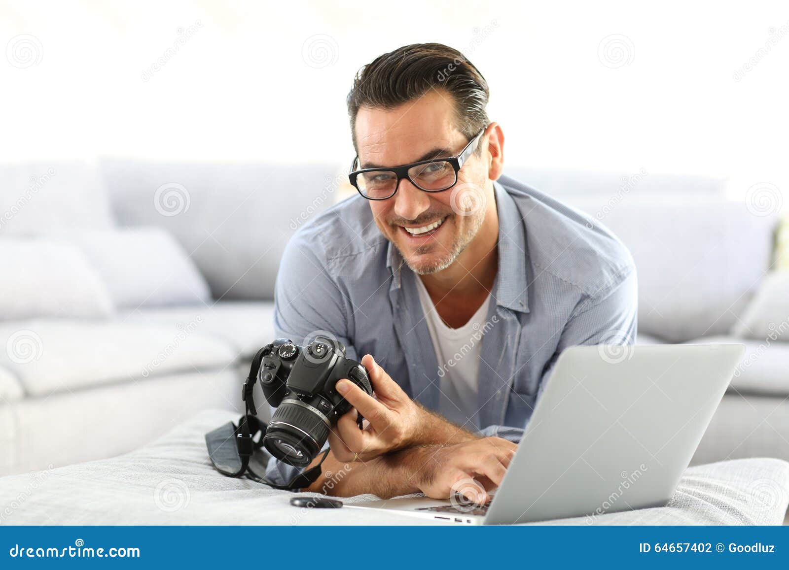 Man at Home Using Digital Camera Stock Photo - Image of amateur ...