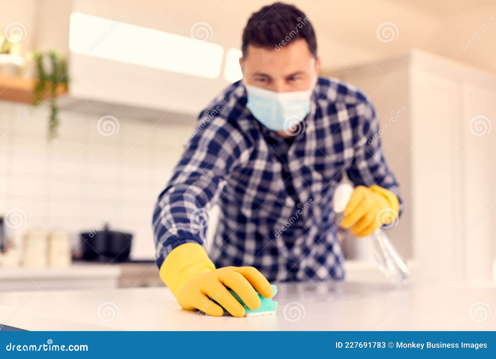 Man at Home Wearing Mask in Kitchen Doing Housework and Cleaning ...