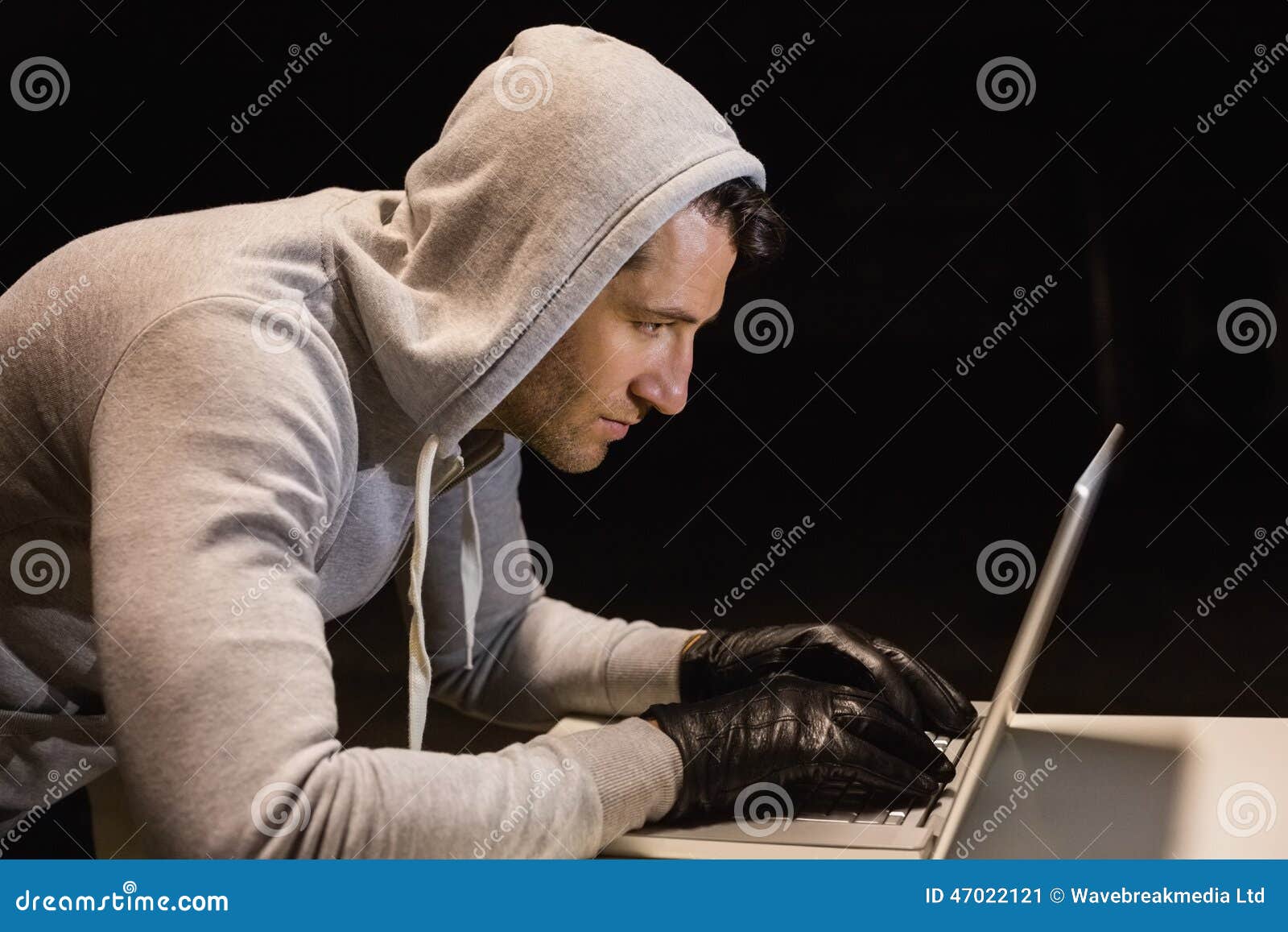 Man in Hood Jacket Hacking a Laptop Stock Image - Image of person ...