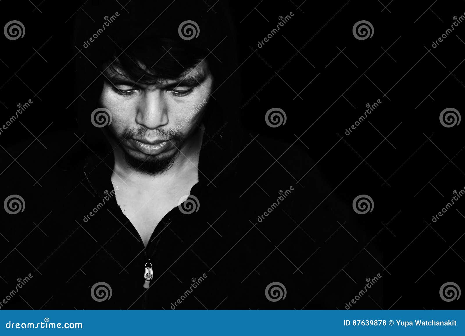 Man in Hood with Lower Head in the Dark Stock Photo - Image of mystery ...
