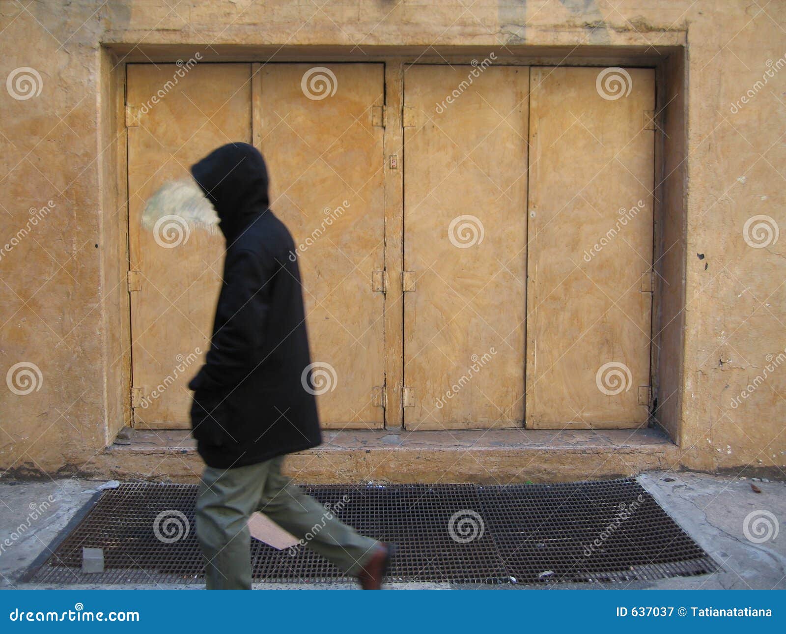 Man with Hood Walking by Double Doors Stock Image - Image of back, hood ...