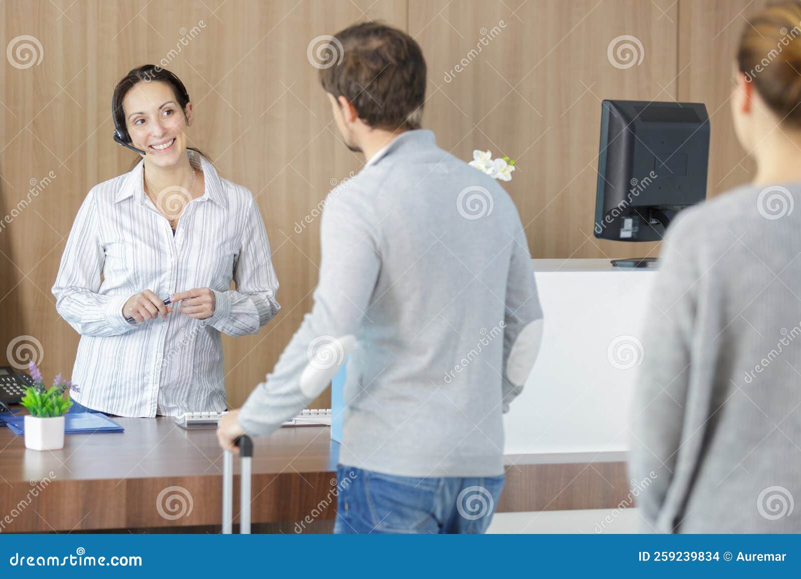 Man at hotel reception stock photo. Image of receptionist - 259239834