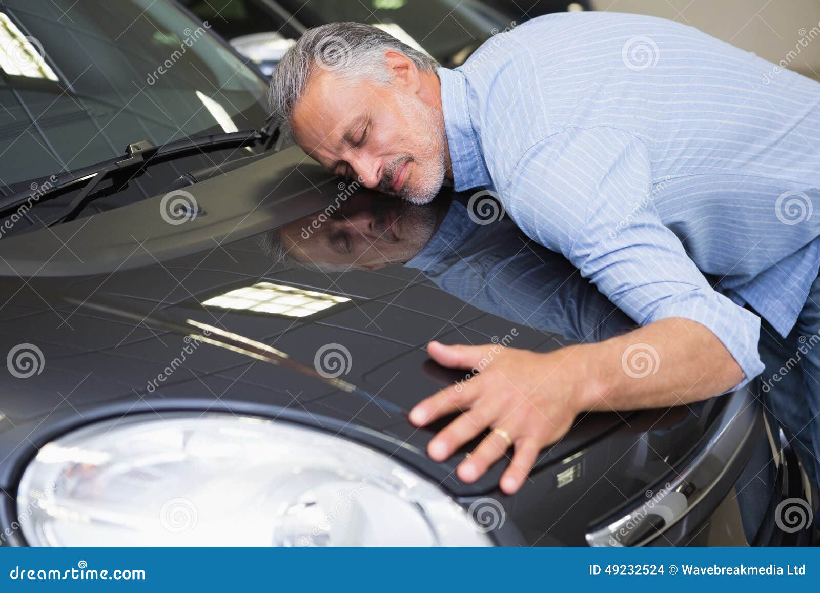 Man hugging on a car stock photo. Image of retail, showroom - 49232524