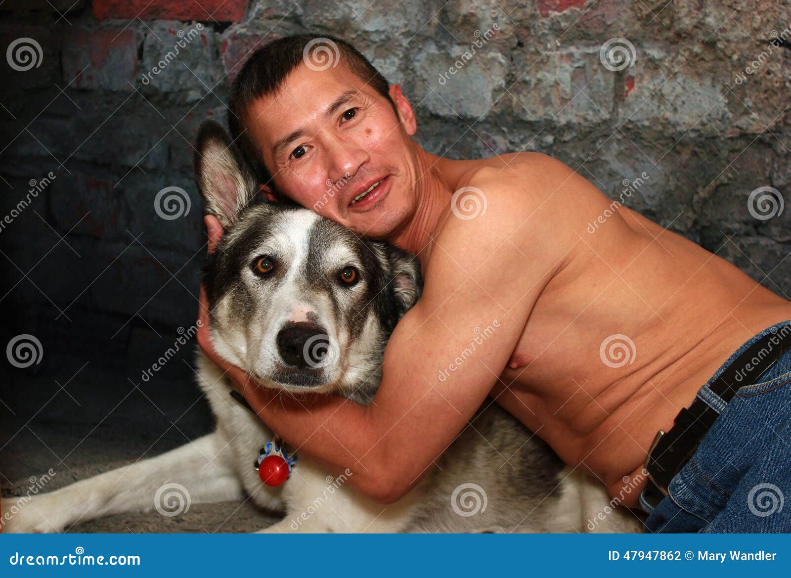 Man Hugging his Dog stock photo. Image of hugging, oriental - 47947862