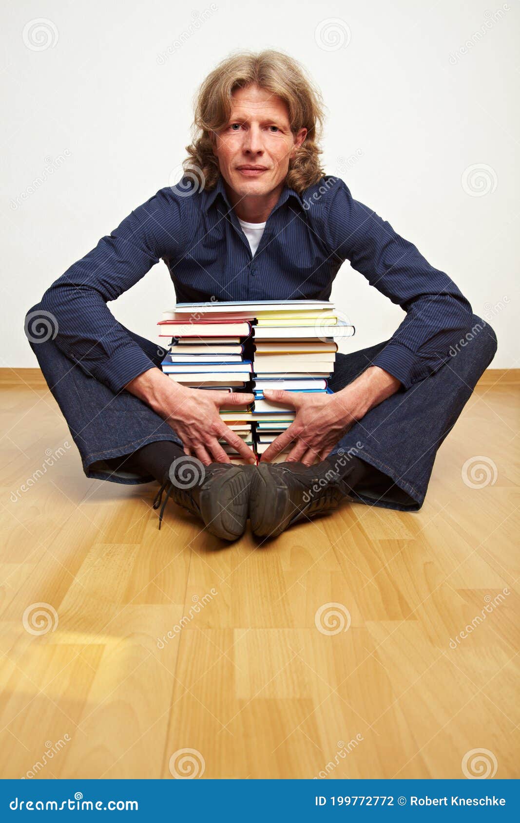 Man hugs books stock photo. Image of clever, pile, public - 199772772