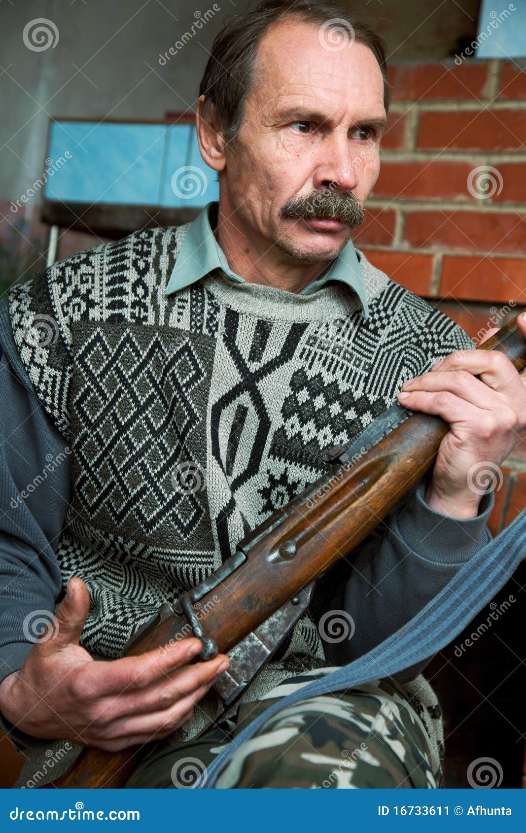 Man the Hunter with a Rifle Stock Image - Image of close, person: 16733611