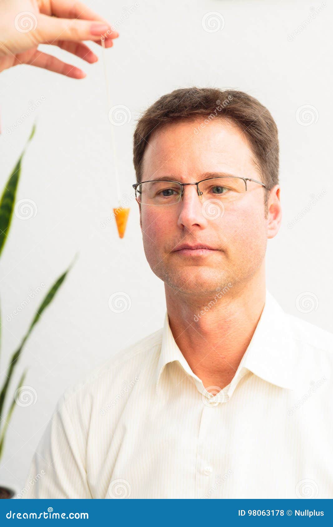 Man Hypnotized by Therapist Stock Photo - Image of working, psychology ...